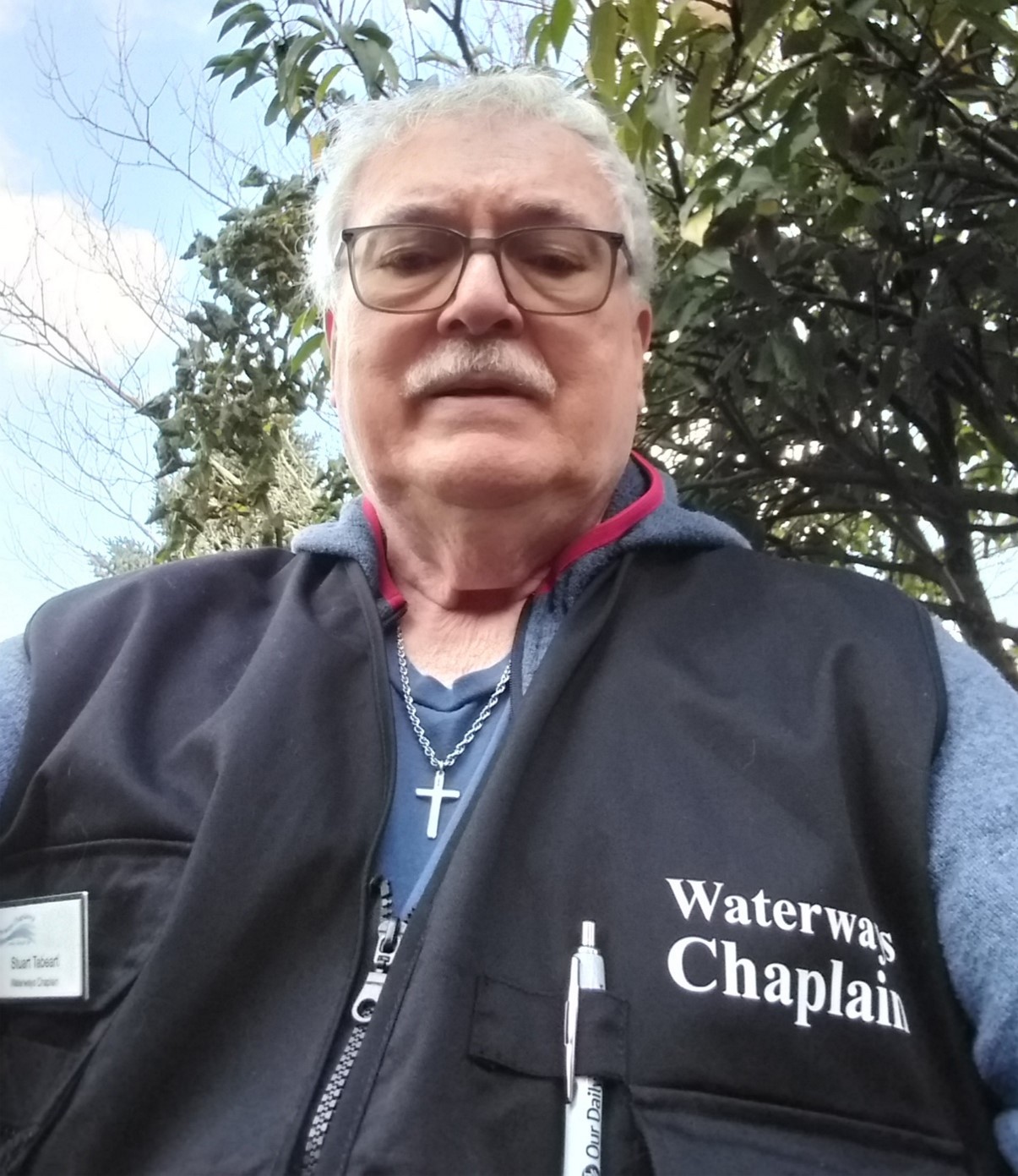 A new Chaplain hands out Bibles to Channel 4 crew